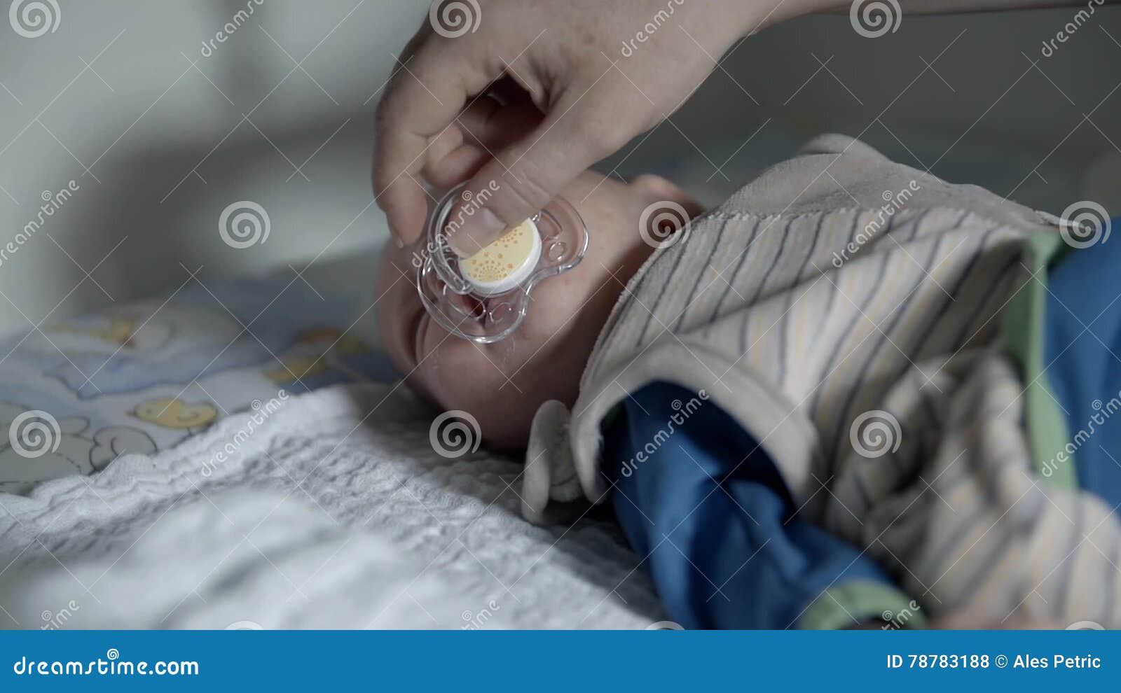 Baby crying with pacifier stock footage. Video of newborn - 78783188