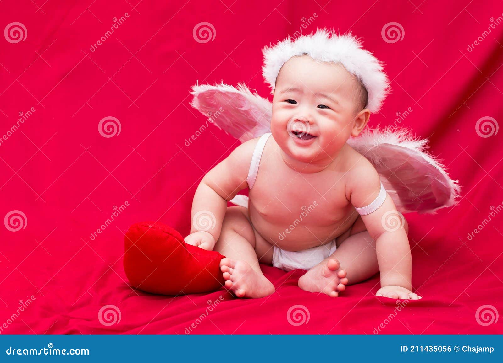 Baby Cupid on Red Background Stock Photo - Image of cute, childhood ...