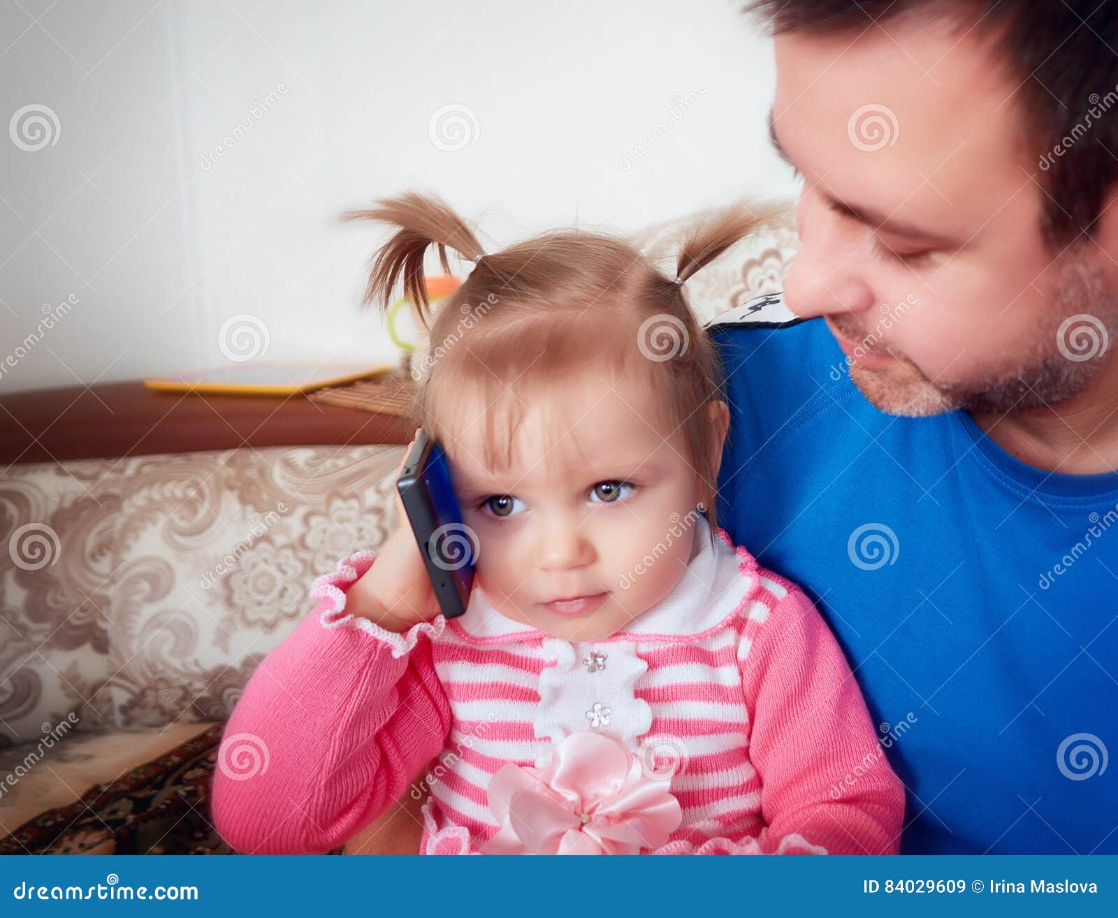 Baby with Dad Get Calls on Grandparents Stock Image - Image of tails ...