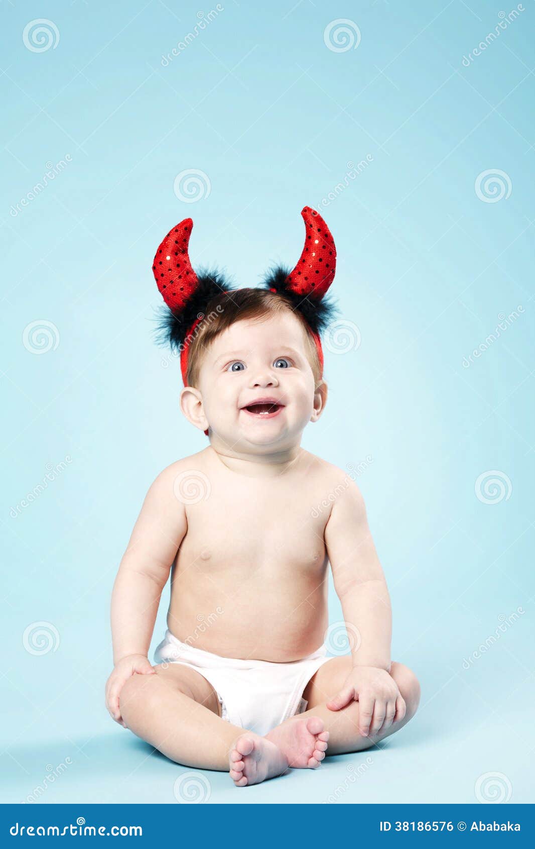 Baby With Devil Horns On Blue Background Stock Photography ...