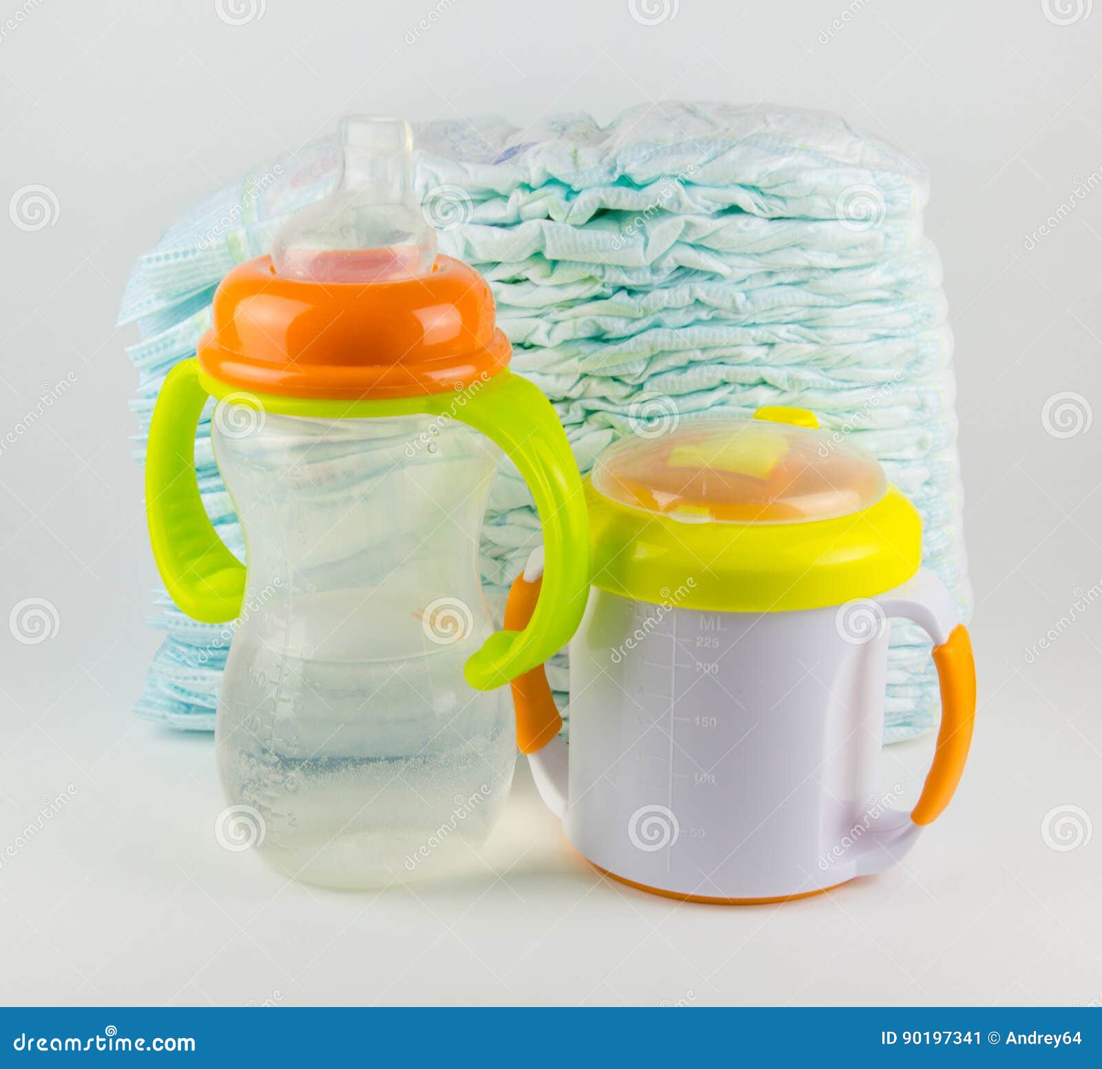 Baby Diapers and Bottles on a White Background Stock Image - Image of ...