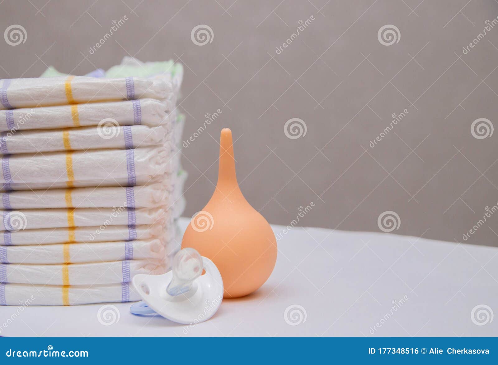 Baby Diapers. Hygiene and Cleanliness. a Stack of Diapers on a Light ...