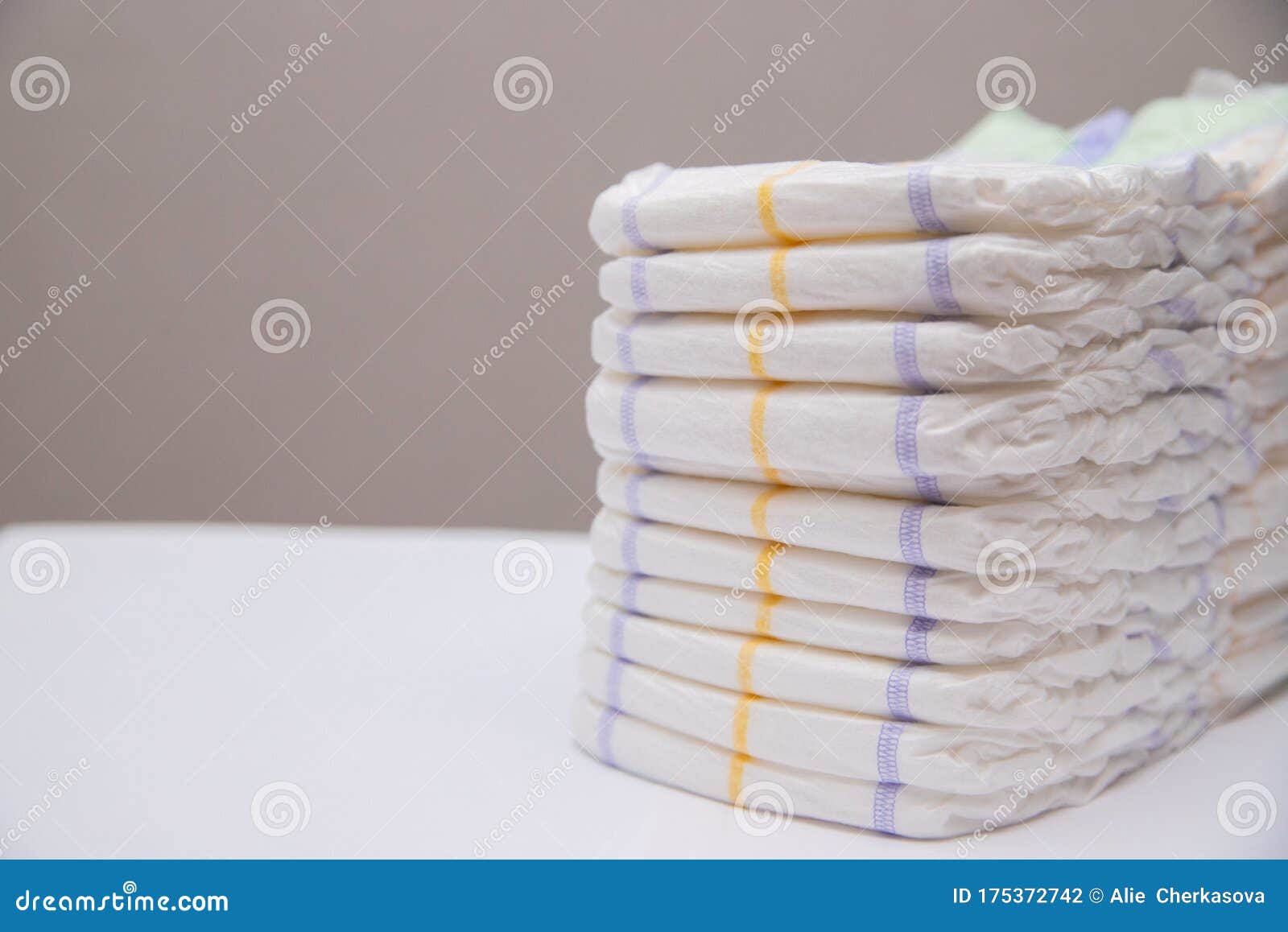Baby Diapers in a Stack on a White Background Stock Photo - Image of ...