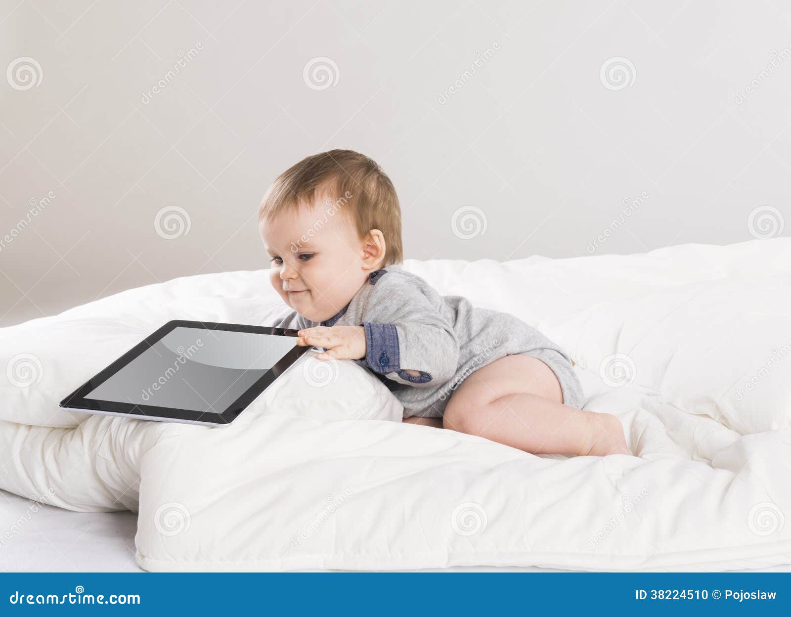 Baby with digital tablet stock photo. Image of small - 38224510