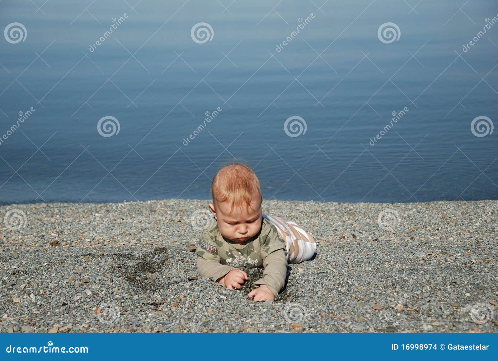 The Baby Digs a Hole in Sand Stock Photo - Image of sand, little: 16998974