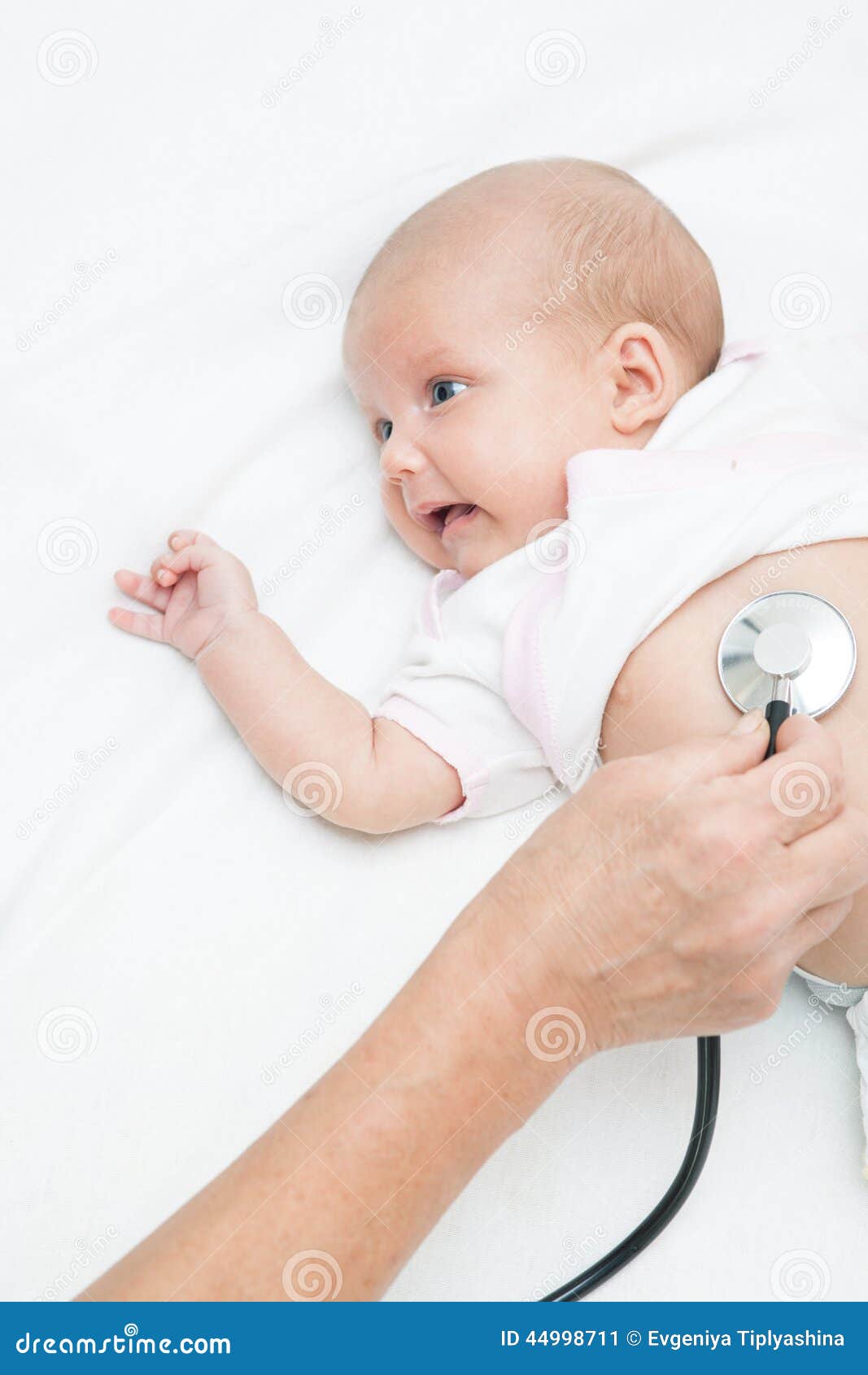 Baby at the doctor stock image. Image of child, month - 44998711
