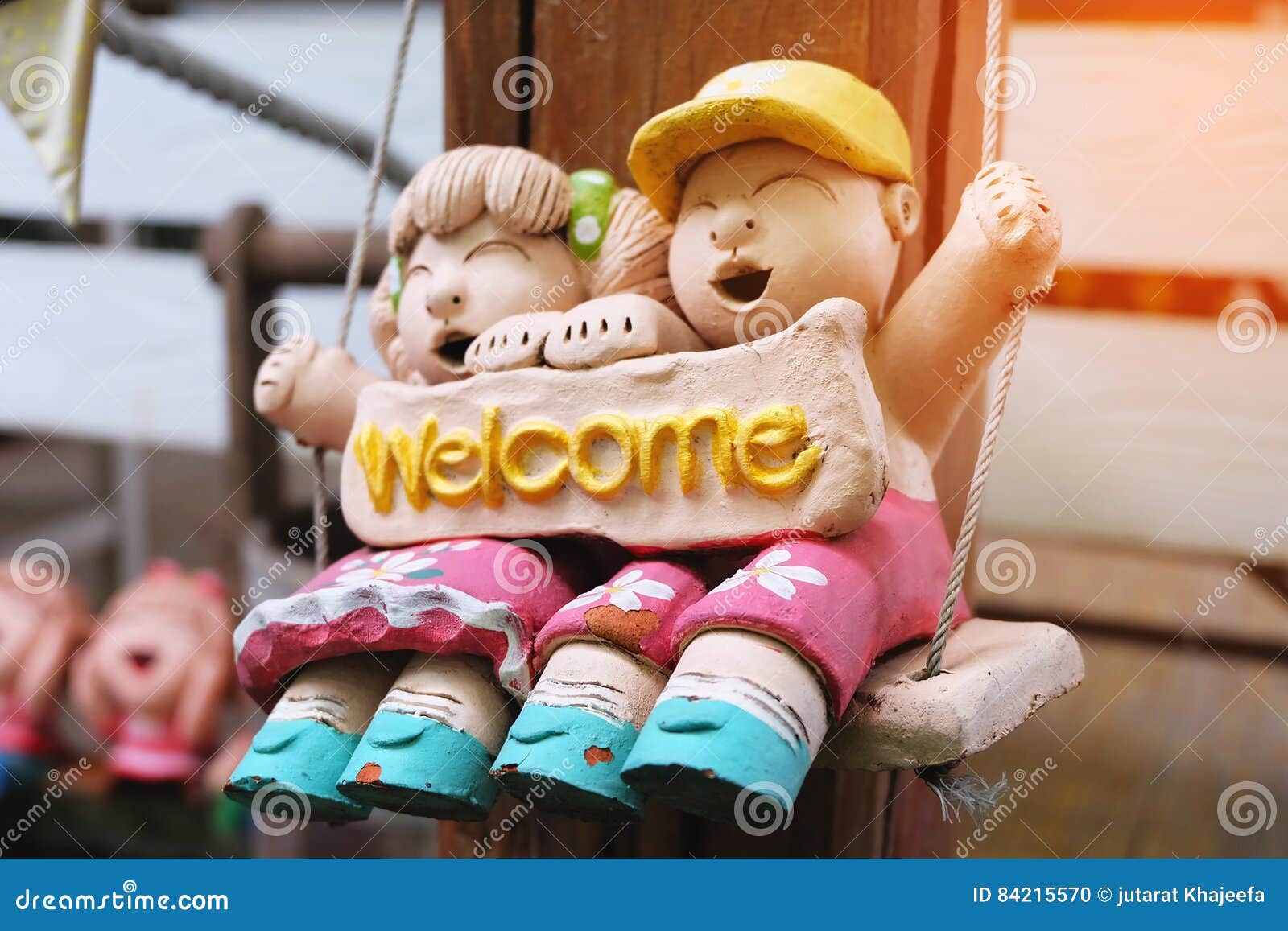Baby Doll Couple with `welcome` Stock Photo - Image of clay, welcome ...