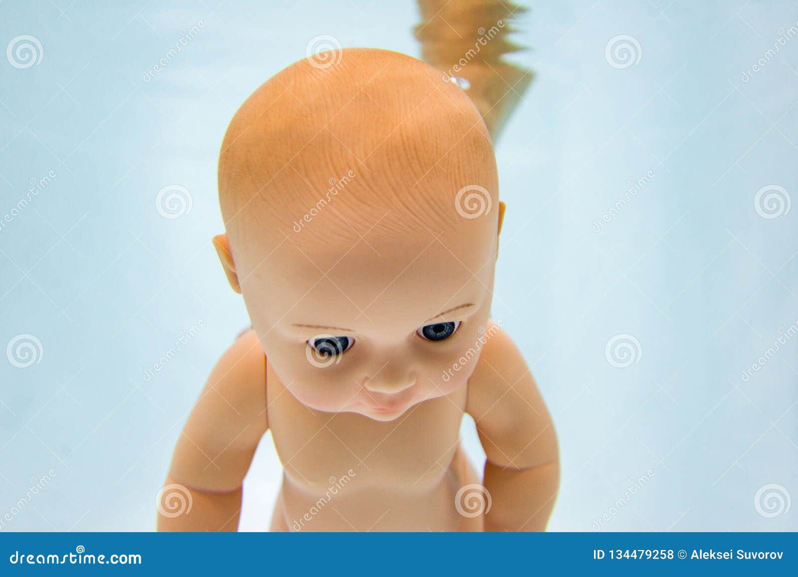 Baby Doll Under Water . Bathing Baby Under Water. Stock Photo - Image ...