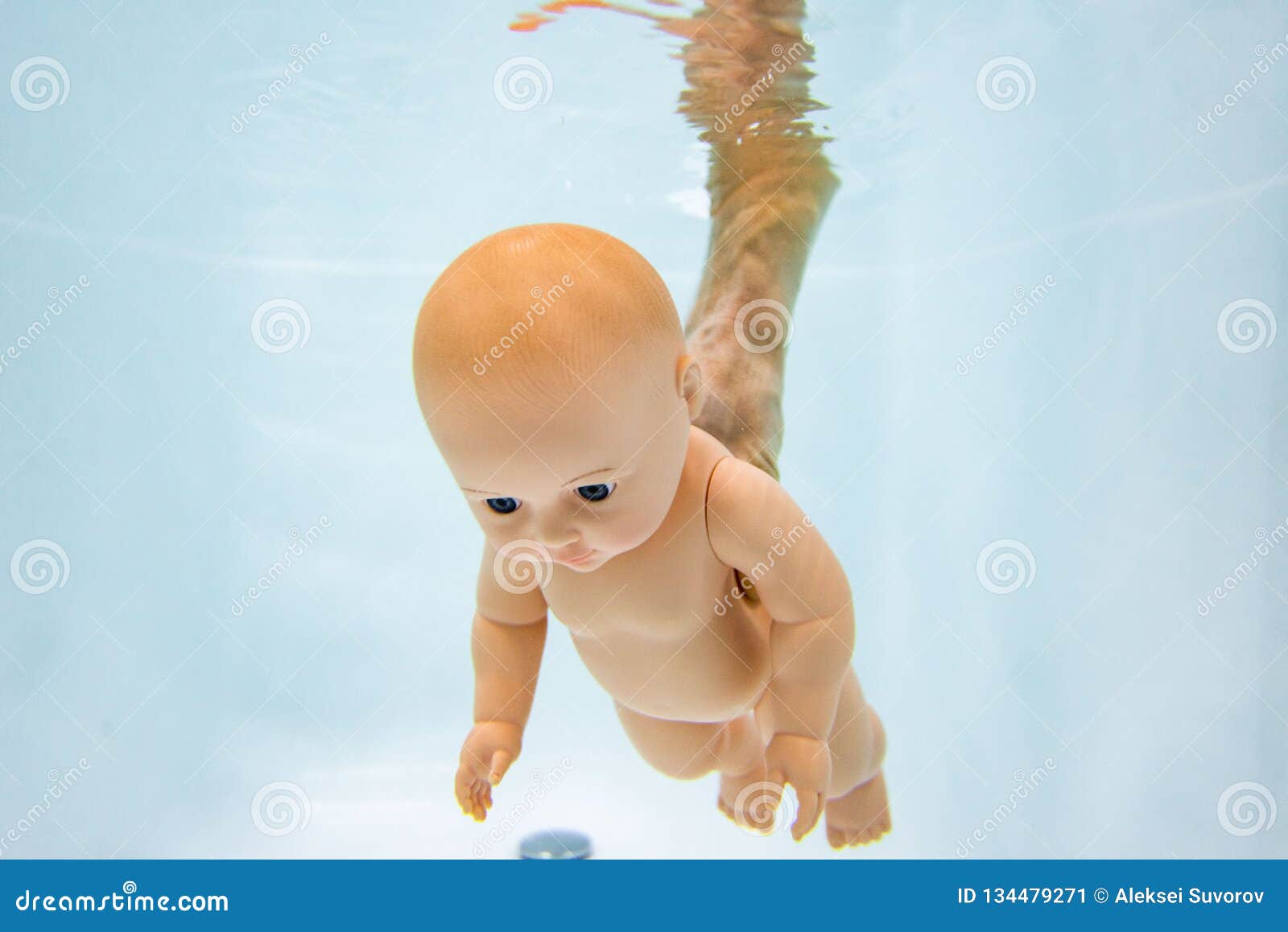 Baby Doll Under Water . Bathing Baby Under Water. Stock Image - Image ...