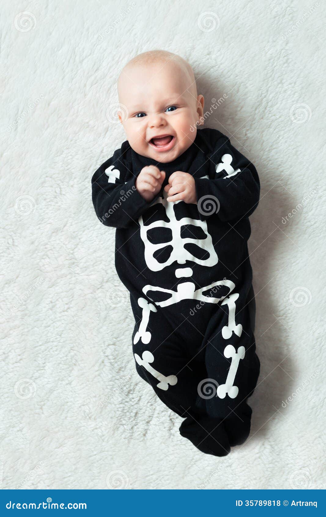 Boy Dressed As A Skeleton Holding A Skull Lollipop In His Hand On The ...