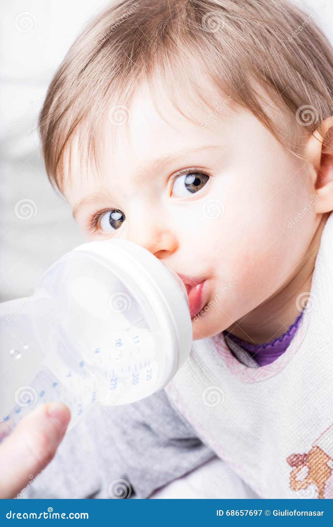 Baby Drinking from a Bottle Stock Image - Image of enjoyment, drinks ...