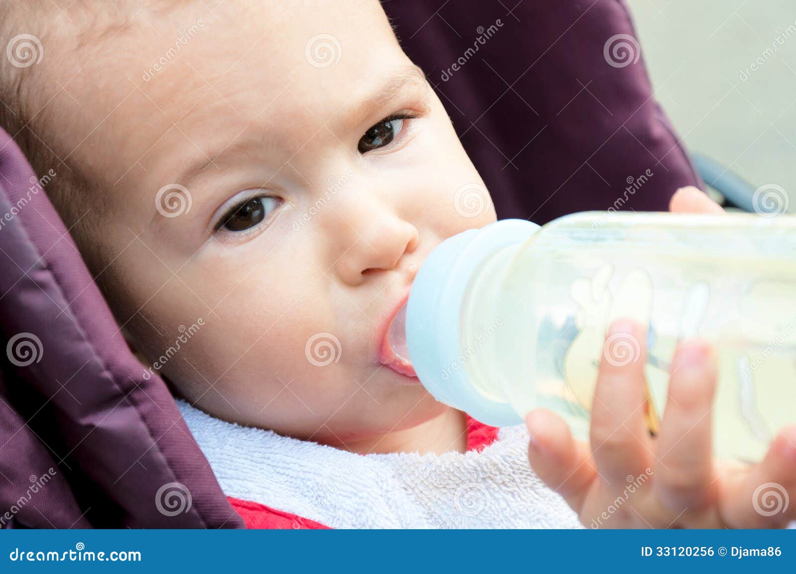 Baby drinking stock photo. Image of charming, mother - 33120256