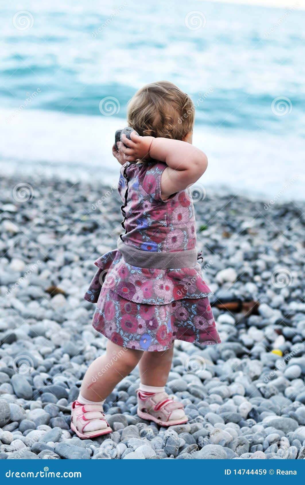 Baby dropping pebble stock image. Image of outdoors, healthy - 14744459