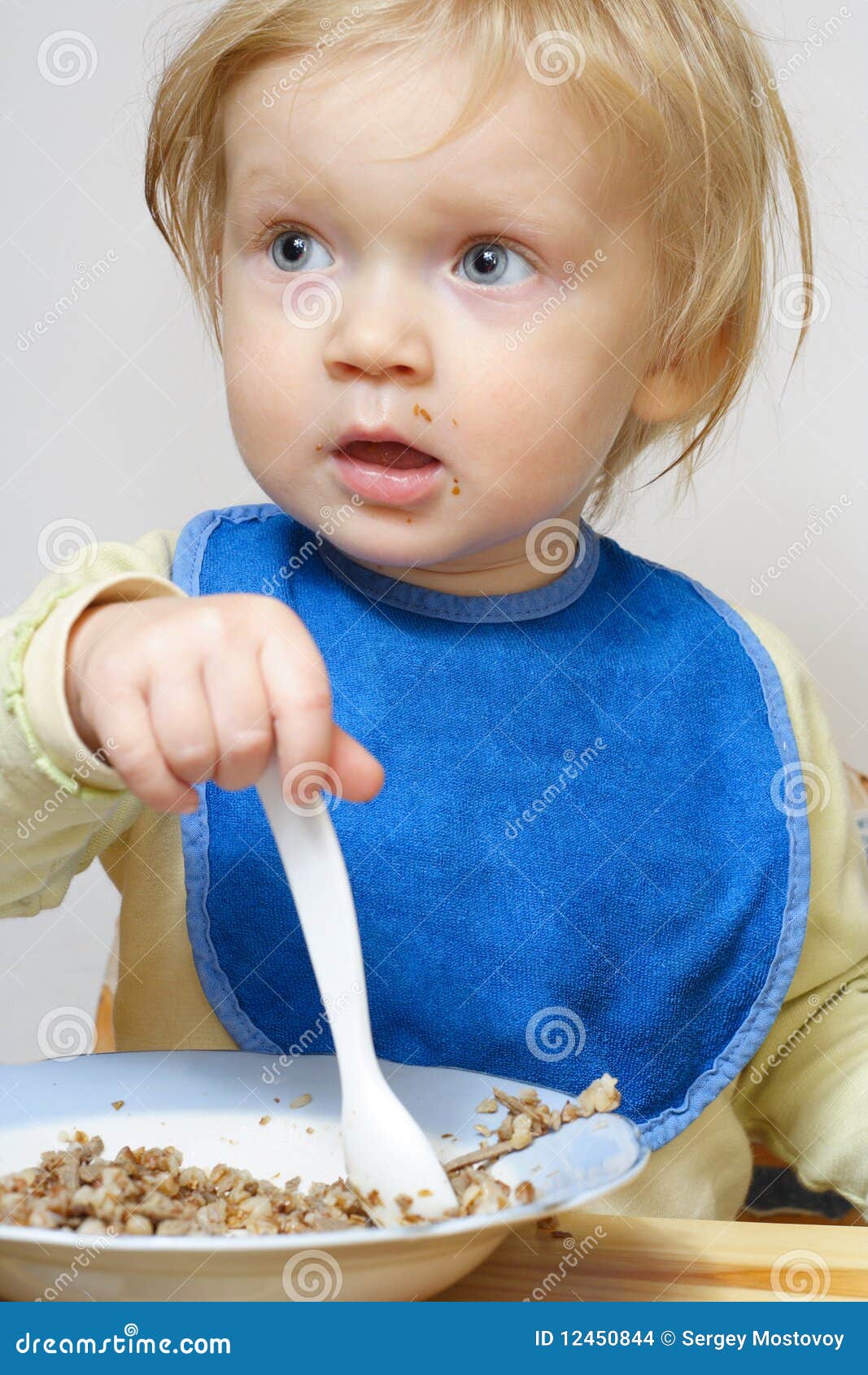 Baby eating stock photo. Image of food, messy, curiosity - 12450844