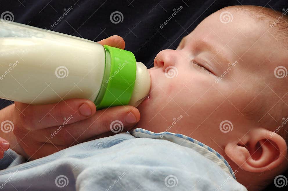 Baby eating. stock image. Image of adorable, milk, nurture - 205795