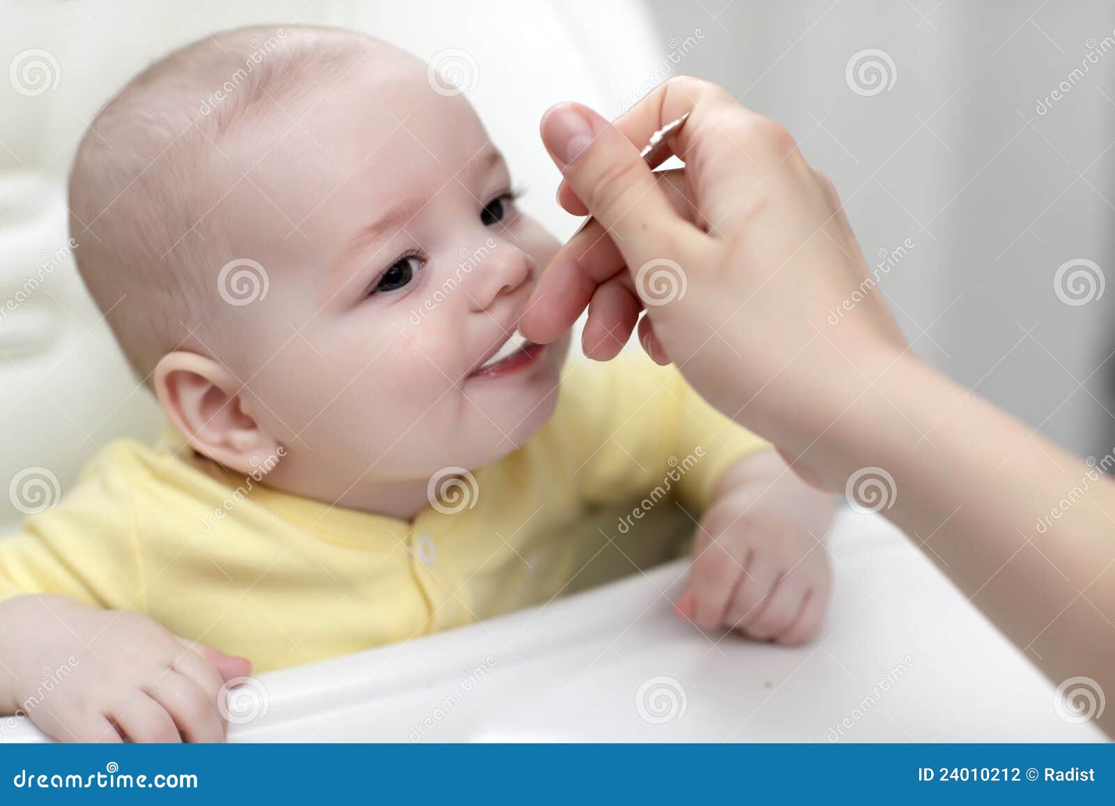 Baby eating stock photo. Image of meal, color, chair - 24010212