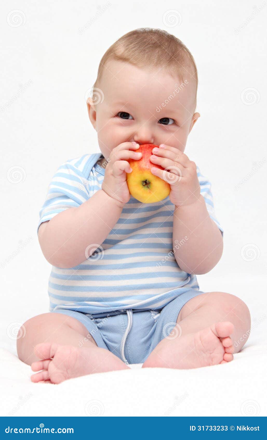 Baby eating apple stock image. Image of infant, feeding - 31733233
