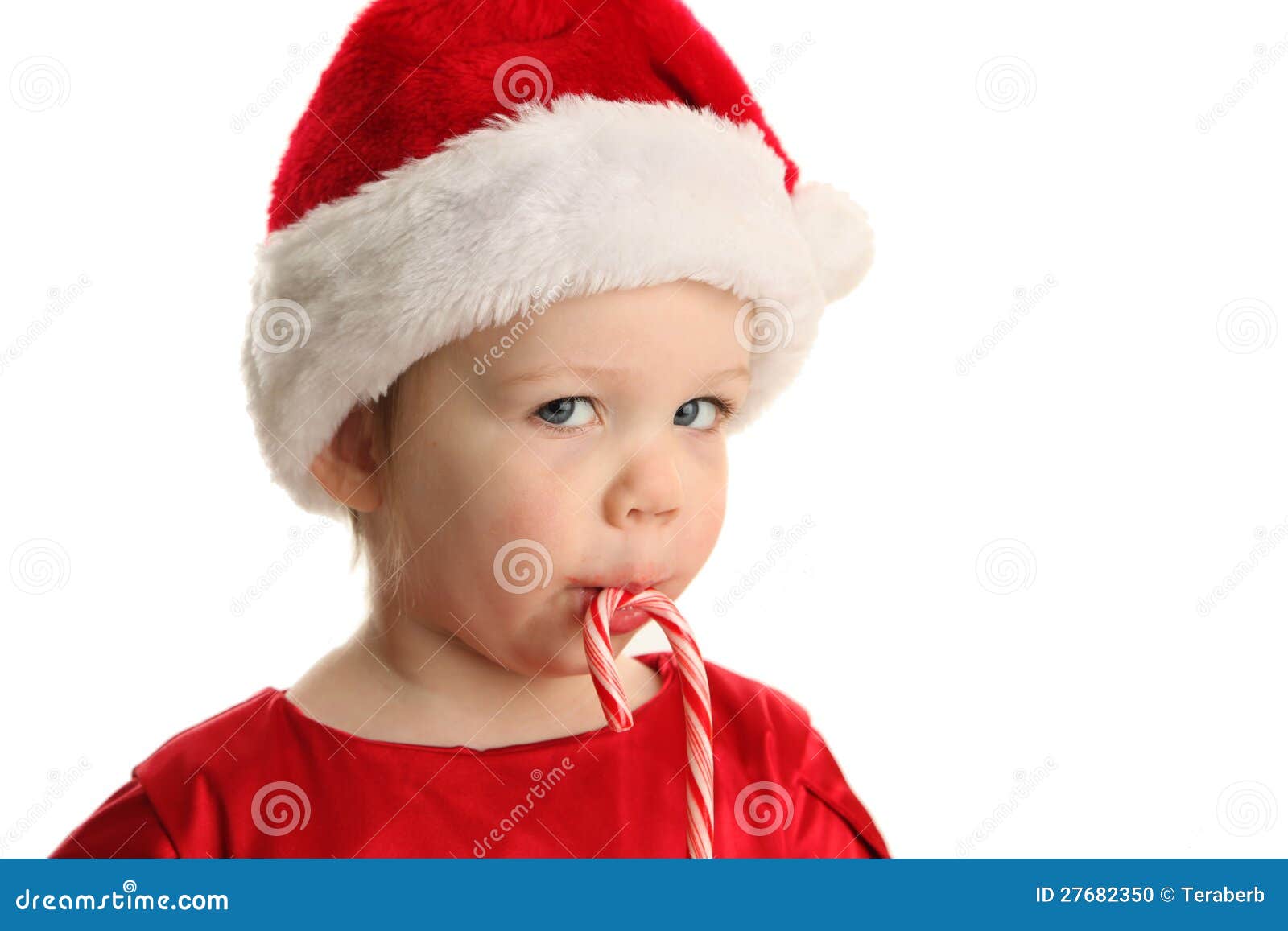 Baby eating a candy cane stock photo. Image of lifestyles - 27682350