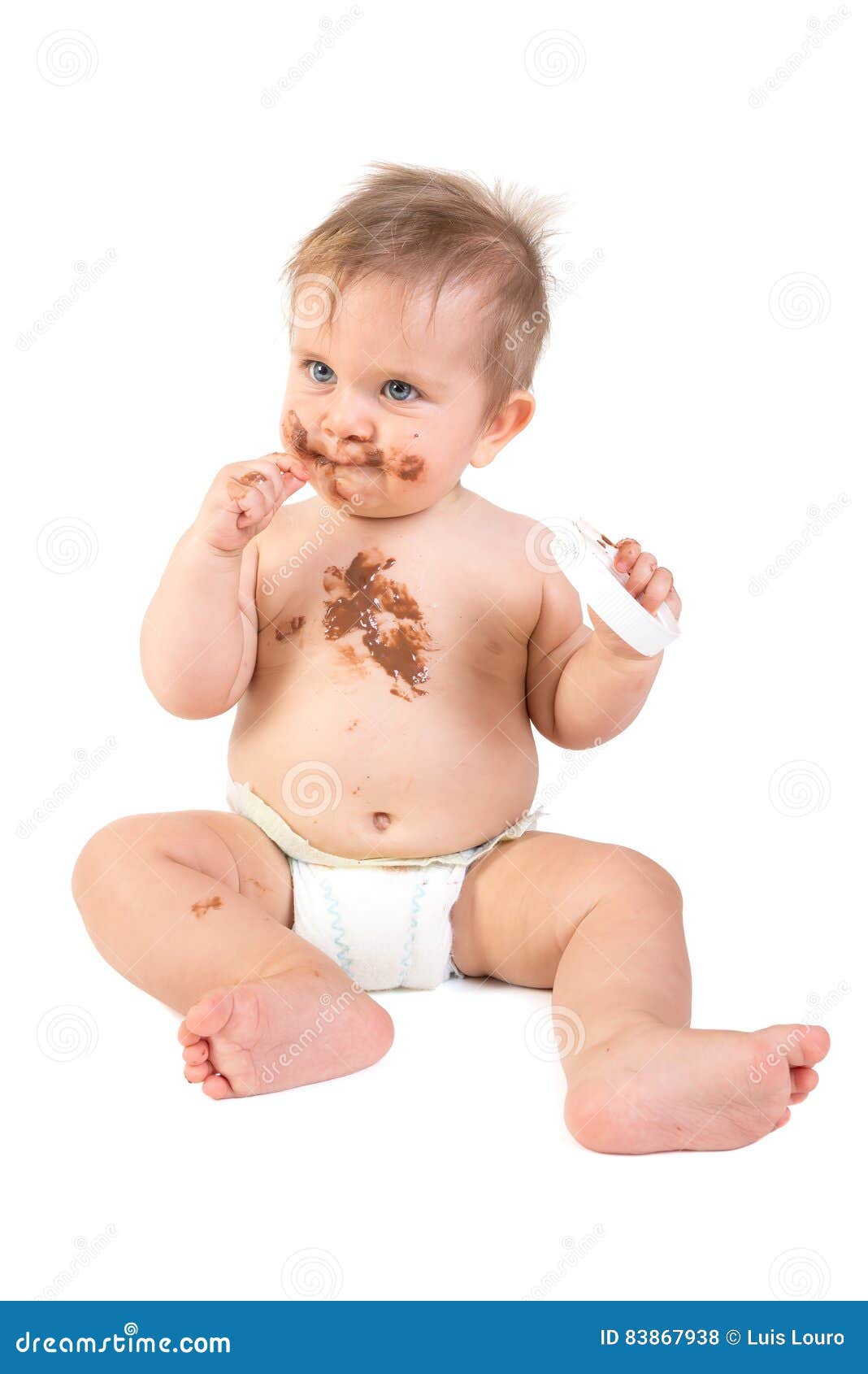 Baby eating chocolate stock photo. Image of caucasian - 83867938