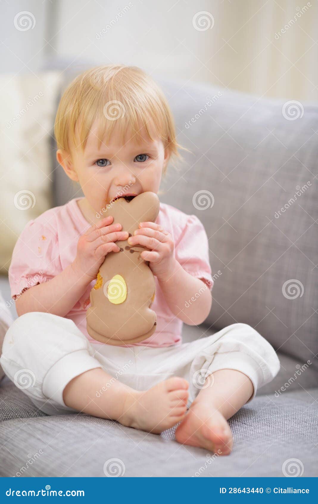 Baby Eating Easter Rabbit Shaped Cookie Stock Photo - Image of blond ...