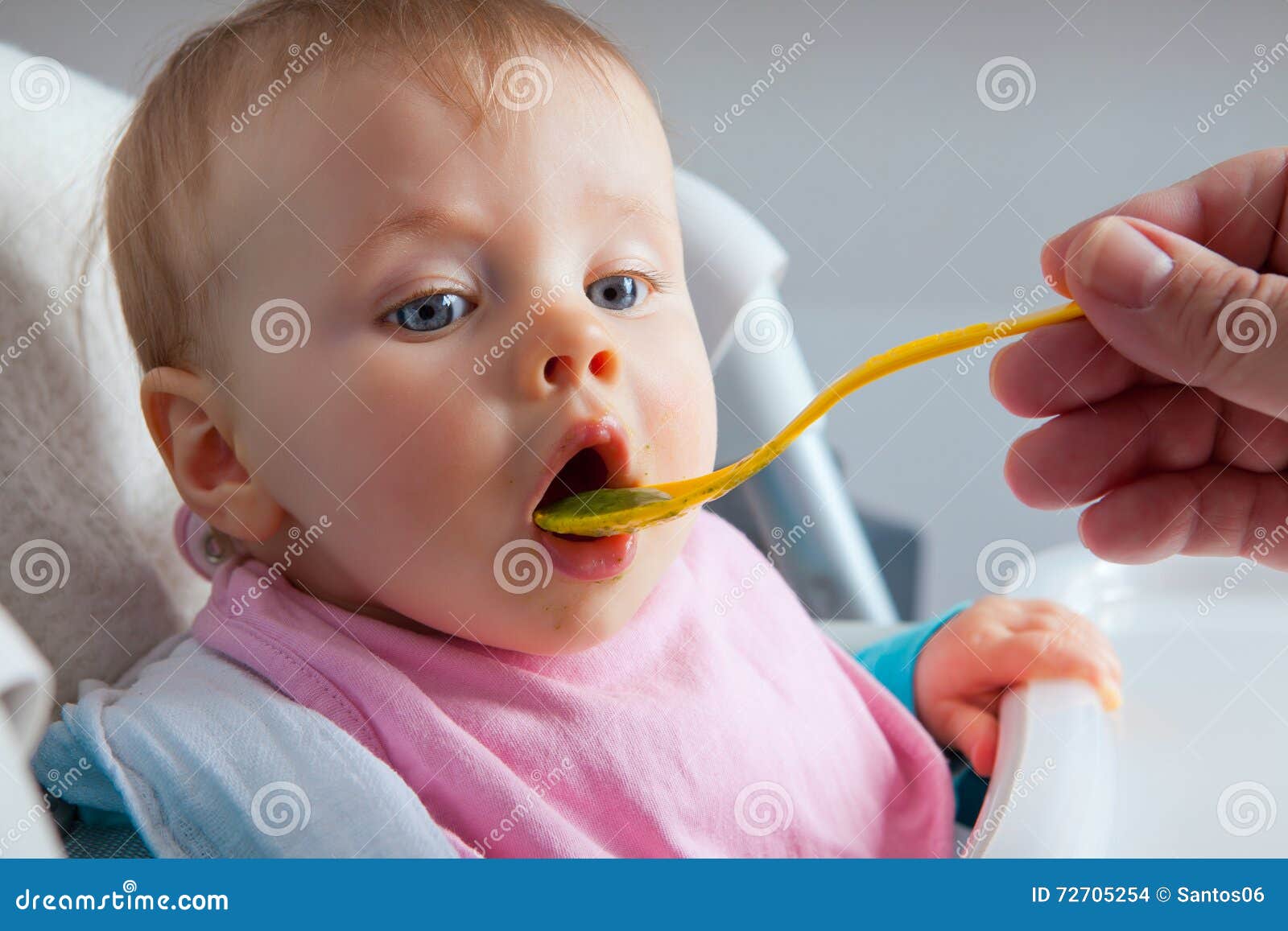 Baby eating stock photo. Image of baby, complementary - 72705254