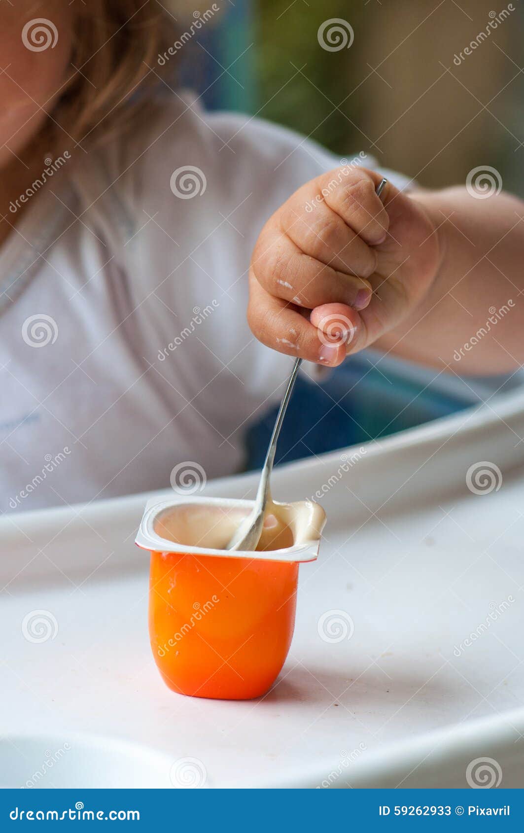 Baby eating yogurt stock image. Image of white, spoon - 59262933