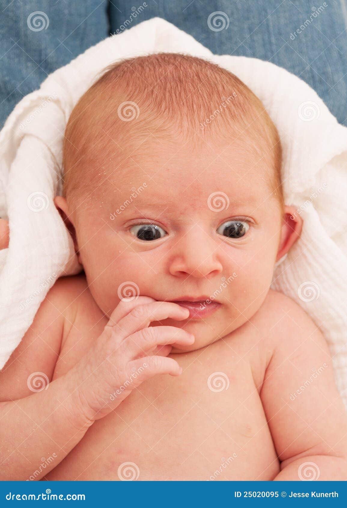 Baby with Expressive Face stock image. Image of holding - 25020095