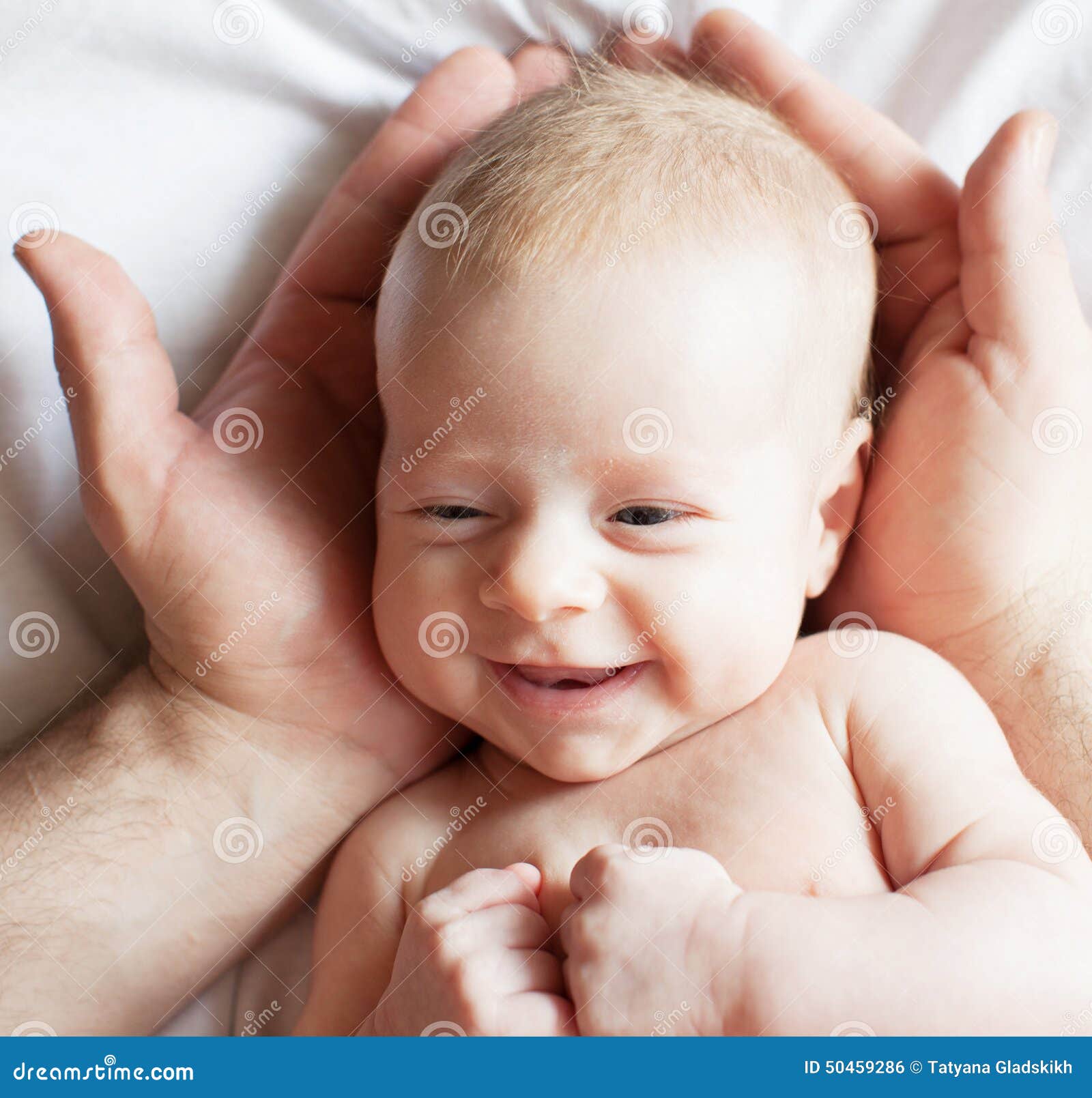 Baby in father s hands stock photo. Image of cute, family - 50459286