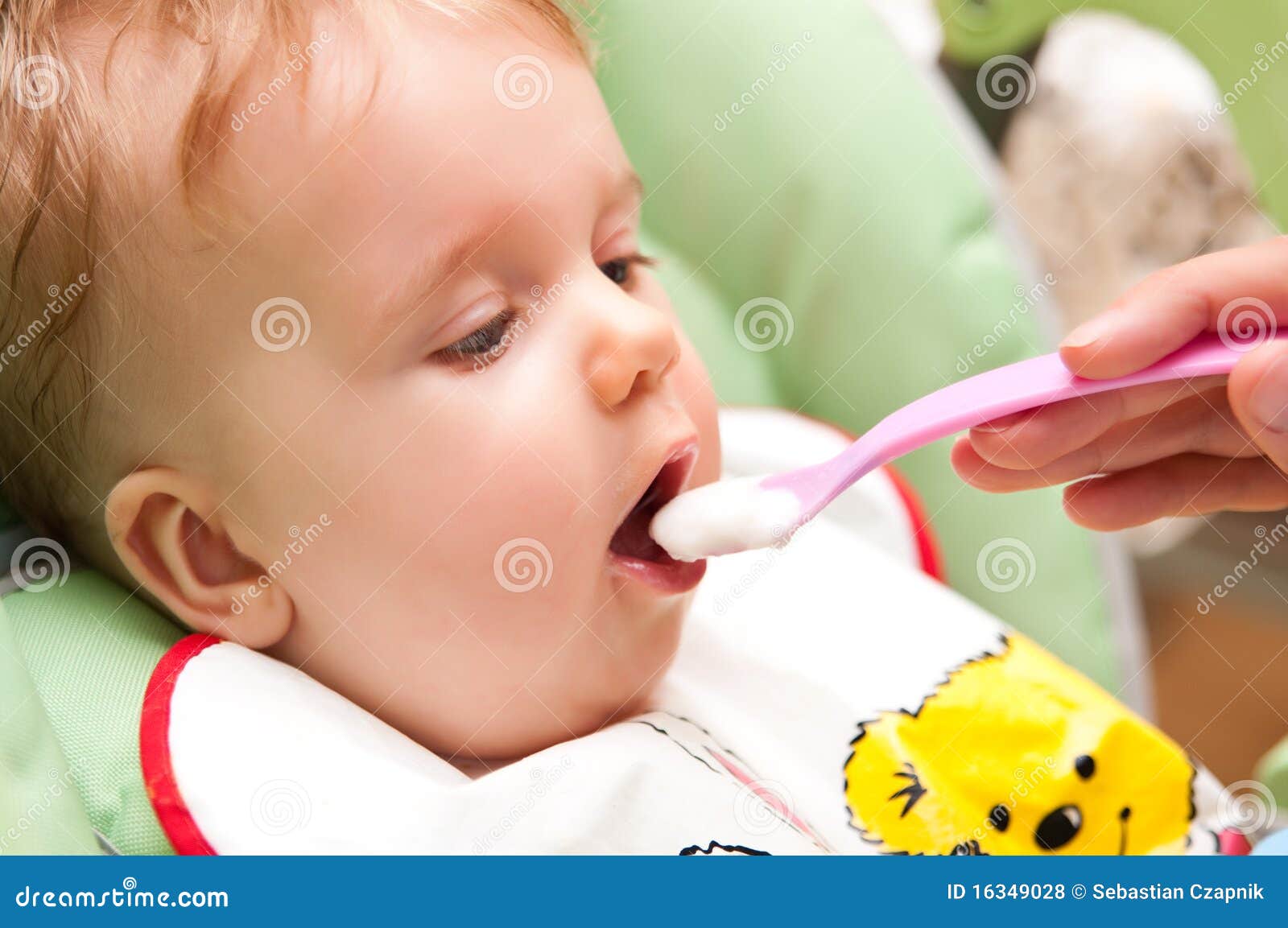 Baby feeding stock photo. Image of lovely, appetite, feeds - 16349028