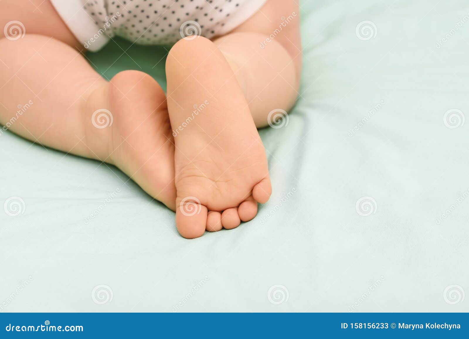 Baby Feet on Green Sheet, Close Up Stock Image - Image of life, blanket ...