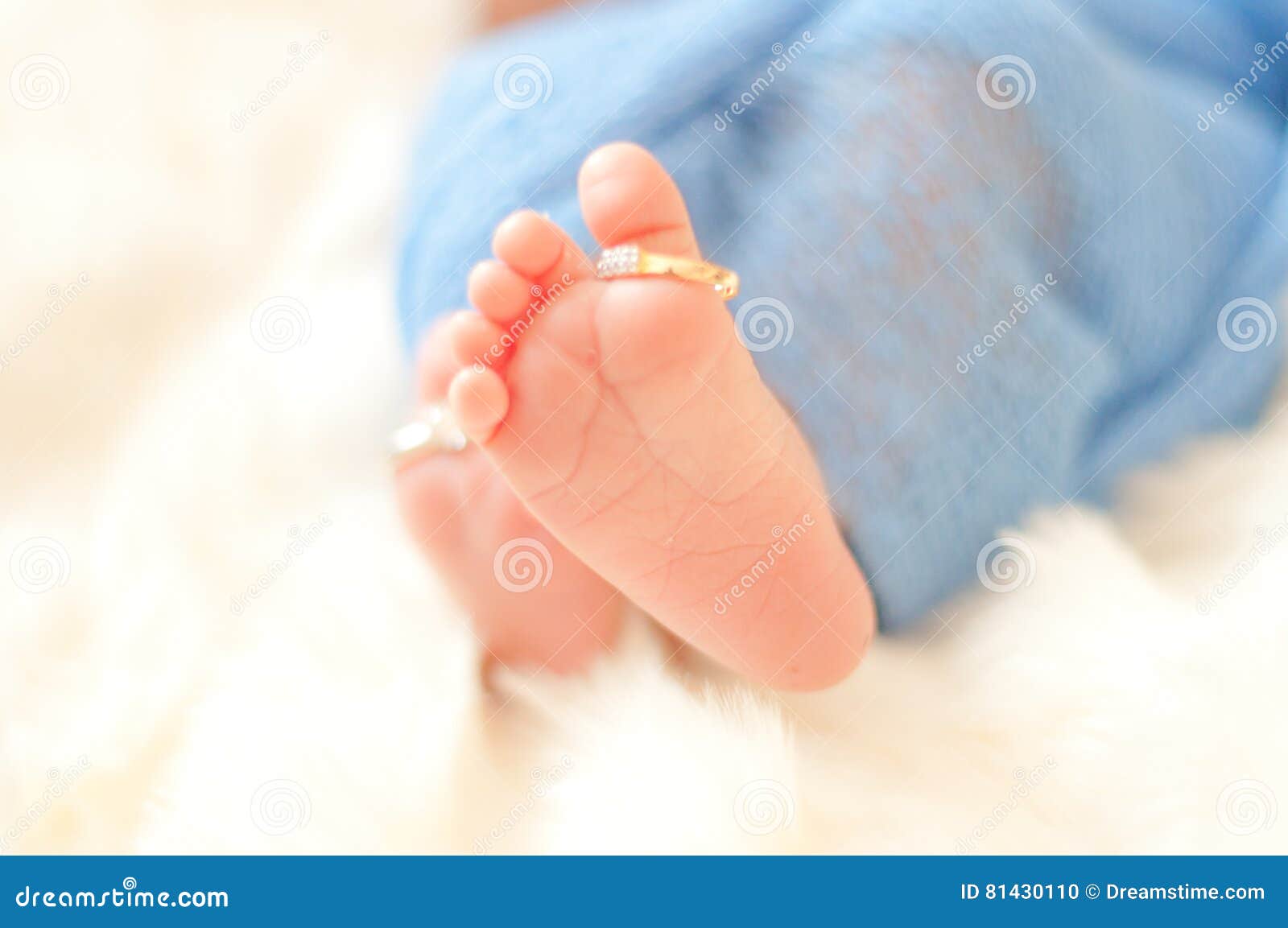 Baby Feet and Ring on Toe stock photo. Image of parents - 81430110
