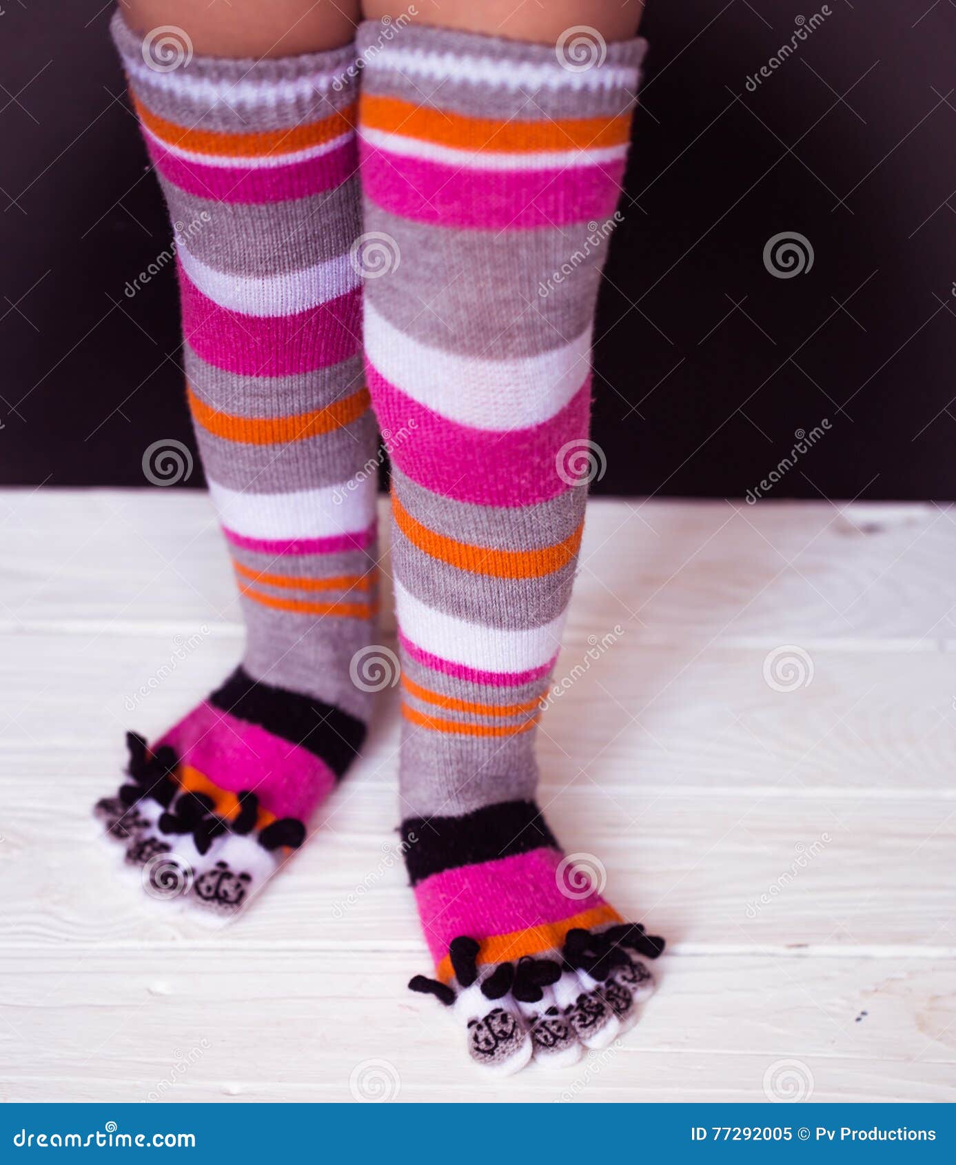 Baby Feet in Warm, Long Multicolored Socks with Toes Stock Image ...
