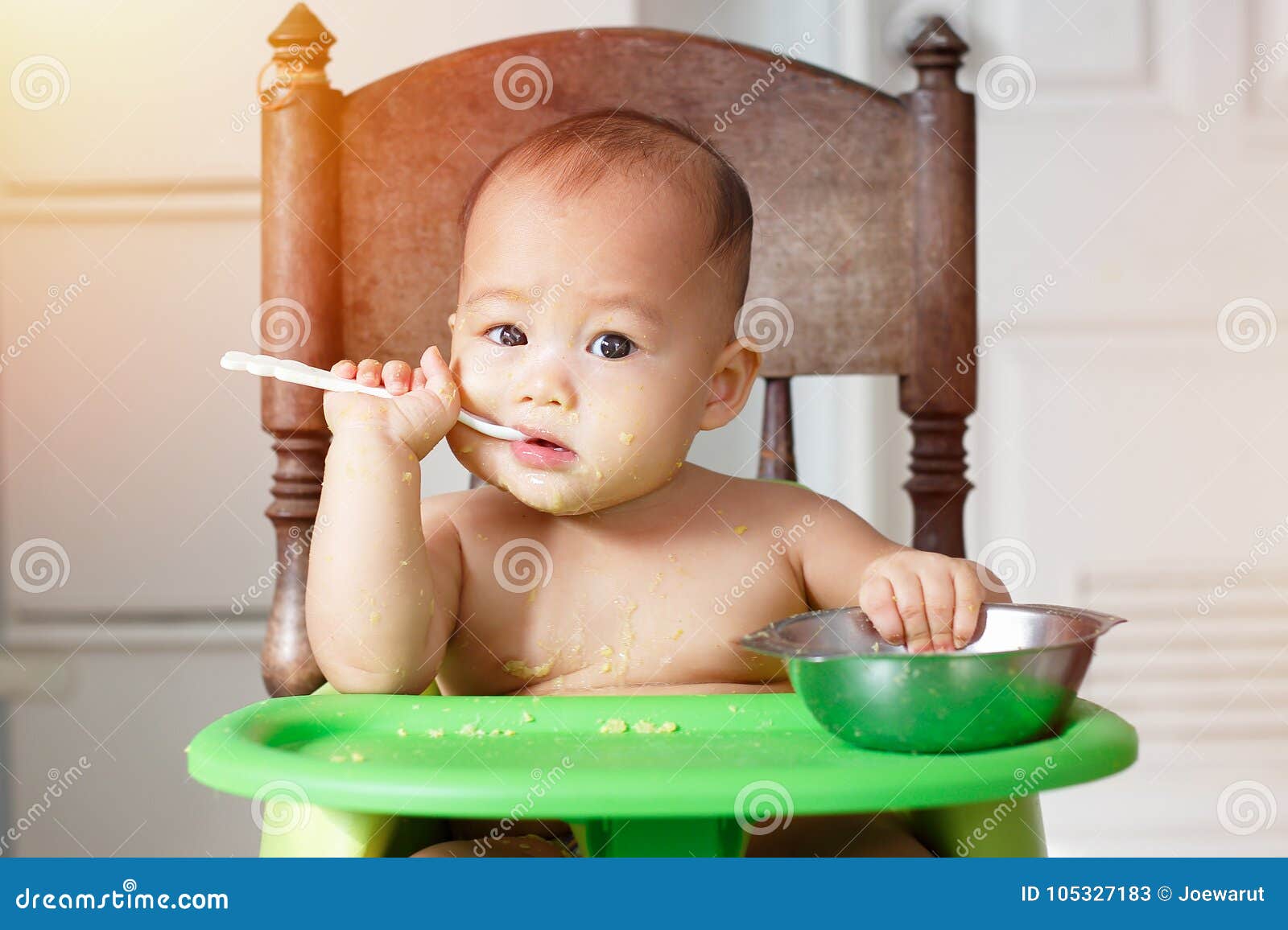 Baby First meal stock image. Image of kitchen, adorable - 105327183