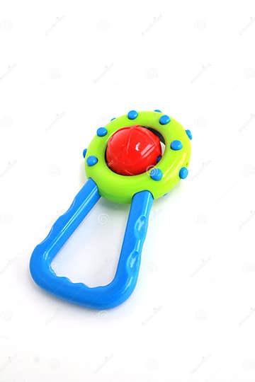 Baby first rattle stock photo. Image of coloured, teether - 9473140