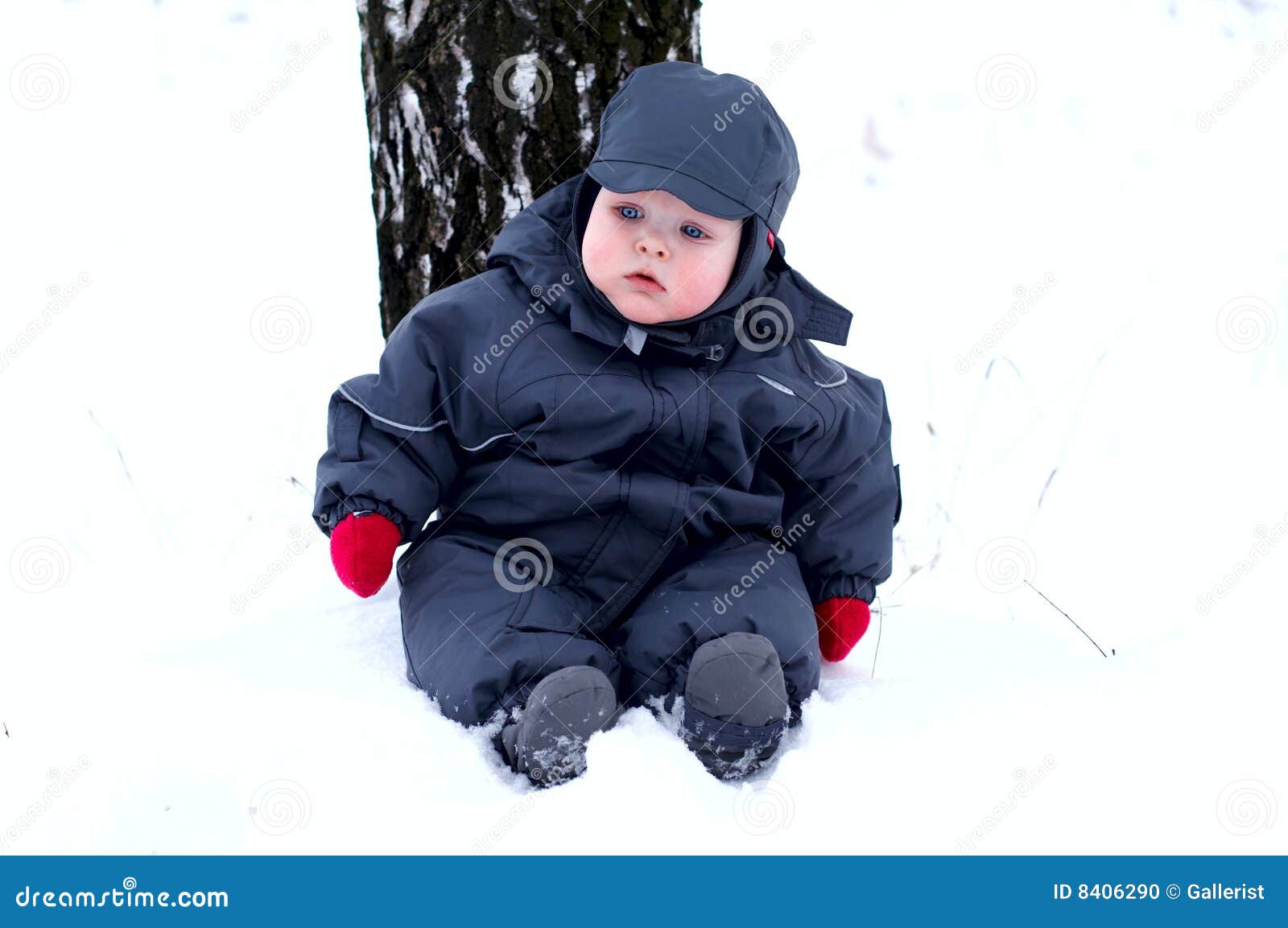 Baby in the first snow stock photo. Image of child, blue - 8406290