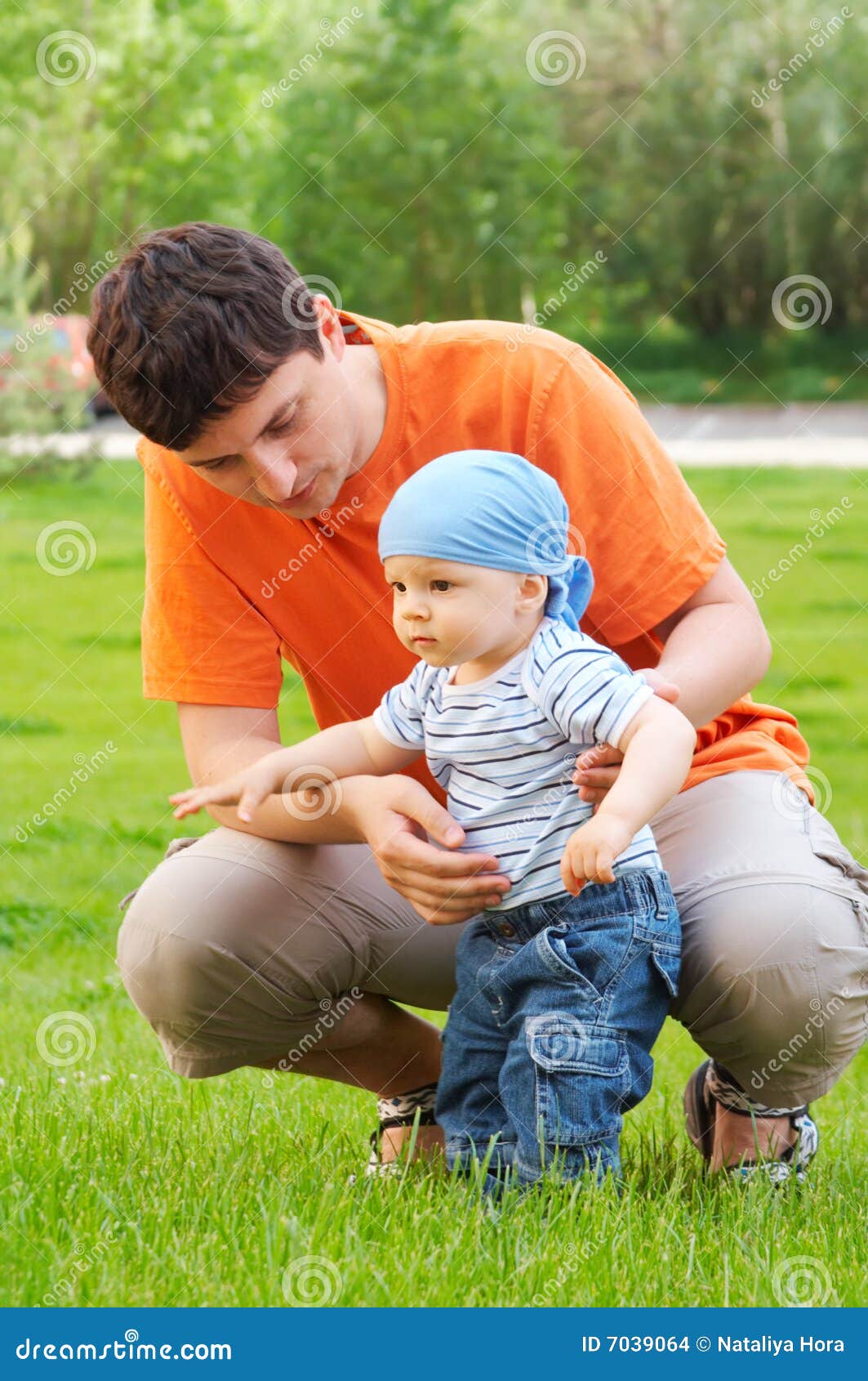 Baby`s First Steps.The First Independent Steps. Funny Baby Boy On Knees ...