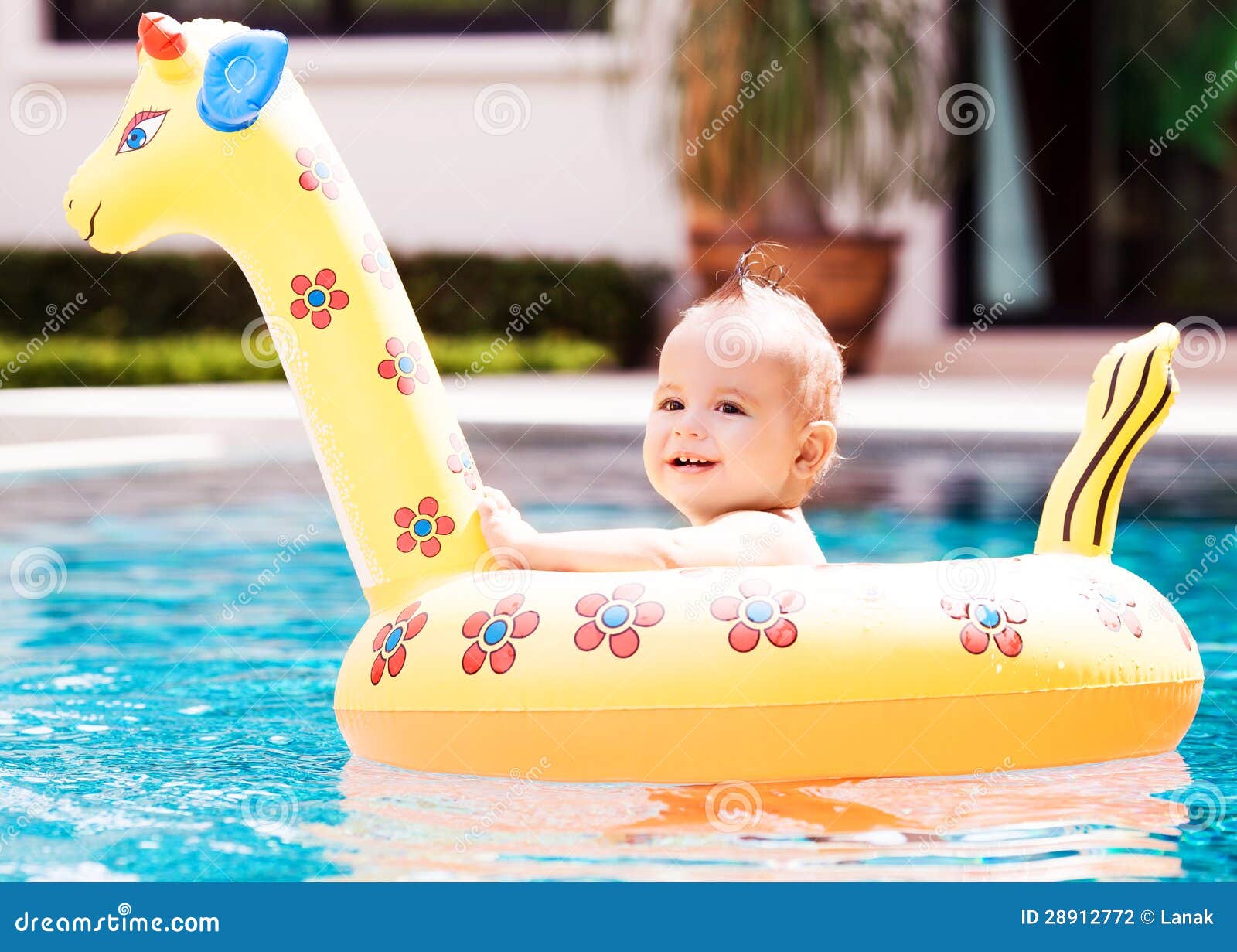 Baby with a float stock photo. Image of colorful, active - 28912772