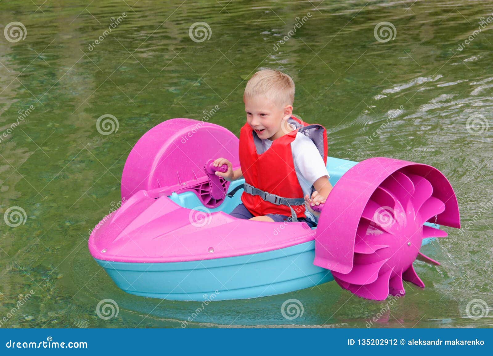 Baby Floats on a Toy Baby Boat. Attraction Stock Photo - Image of ...