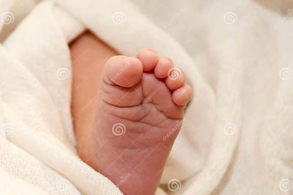 Baby Foot stock photo. Image of cloth, colour, laying - 22260394