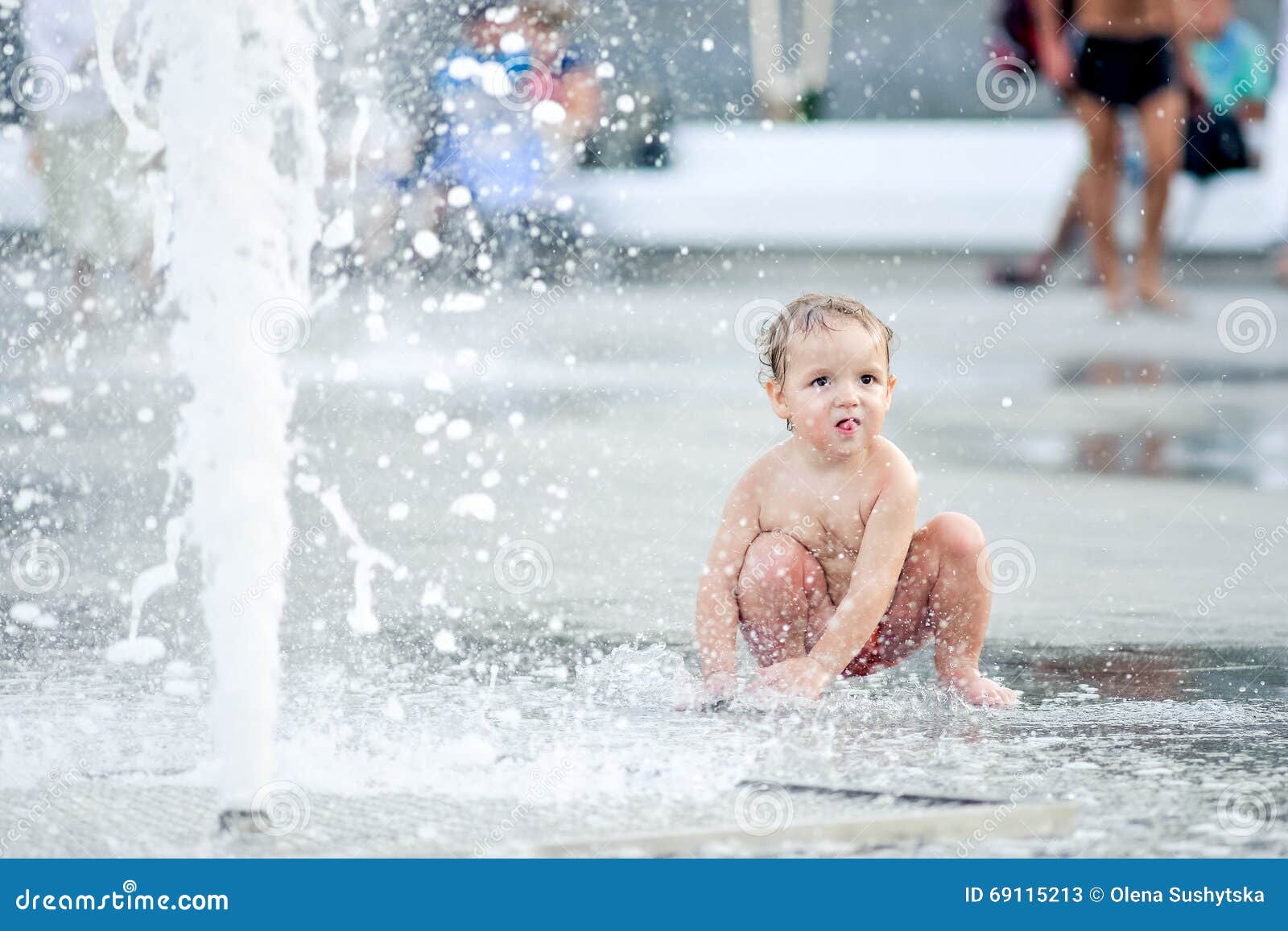 Baby in the fountain stock image. Image of friendship - 69115213