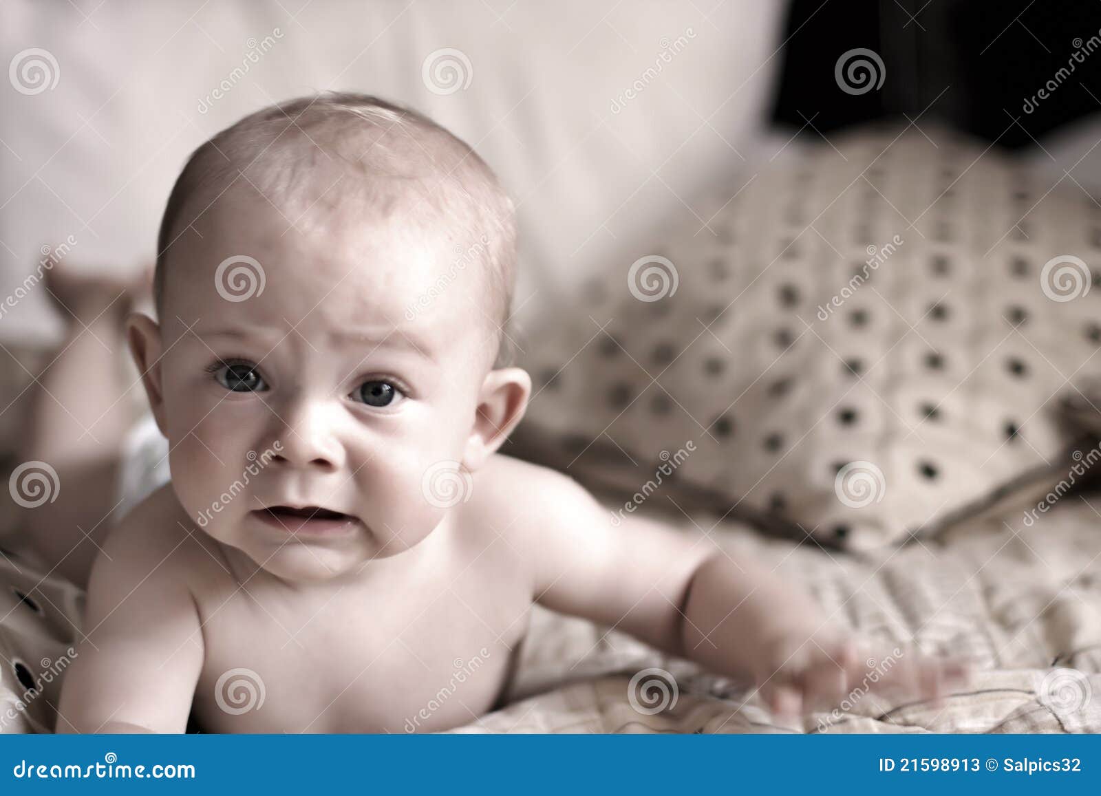 A baby frowning stock image. Image of child, indoors - 21598913