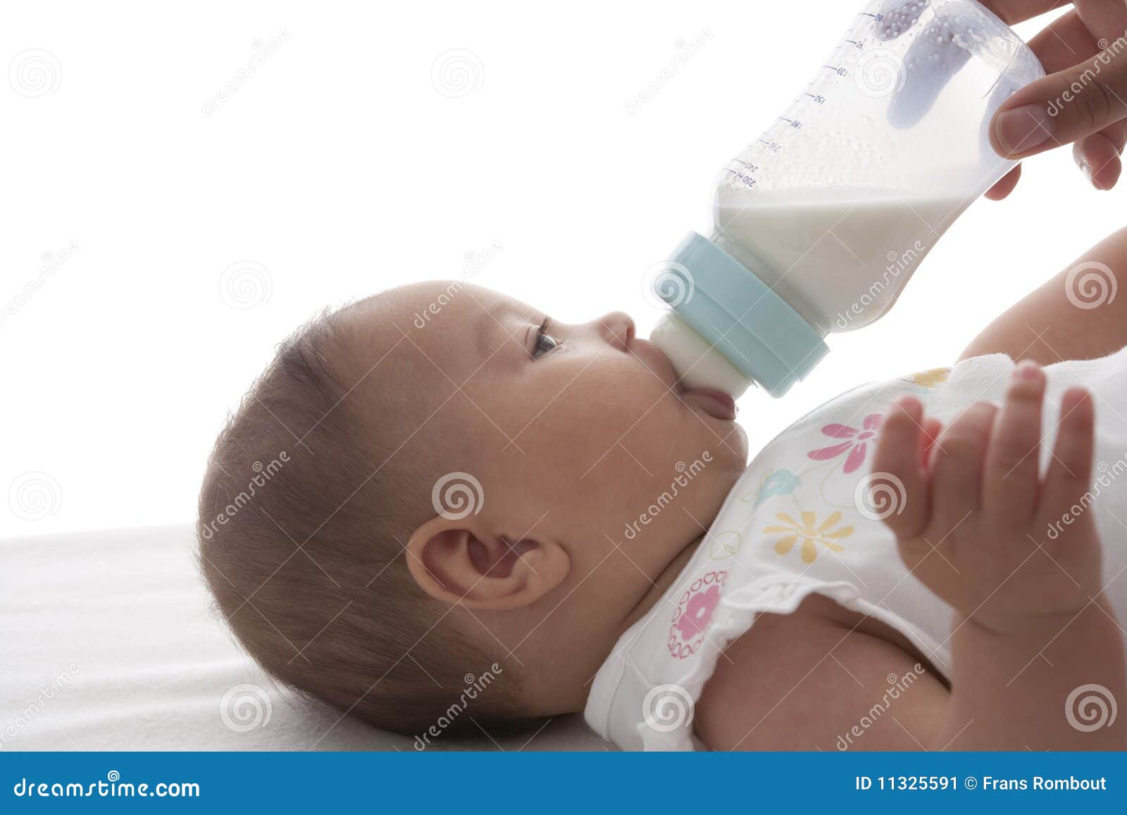 Baby gets bottle-feeding stock image. Image of baby, white - 11325591