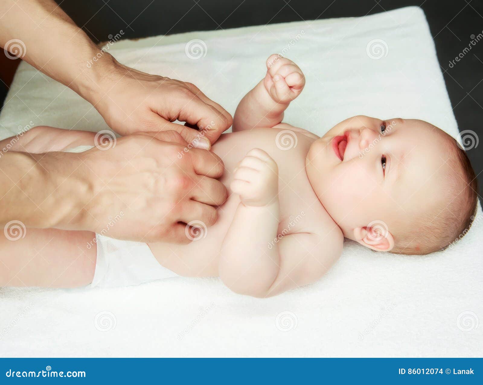 Baby getting massage stock photo. Image of caucasian - 86012074
