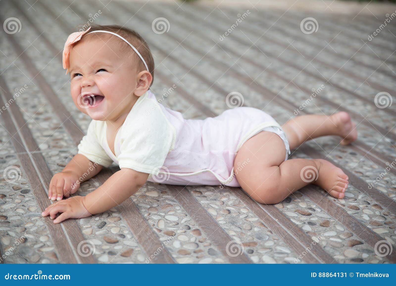 Baby girl crawling outside stock image. Image of child - 88864131
