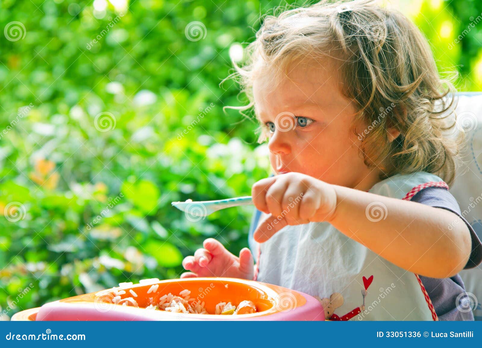 Baby Girl Eating with Spoon Stock Photo - Image of chair, daughter ...