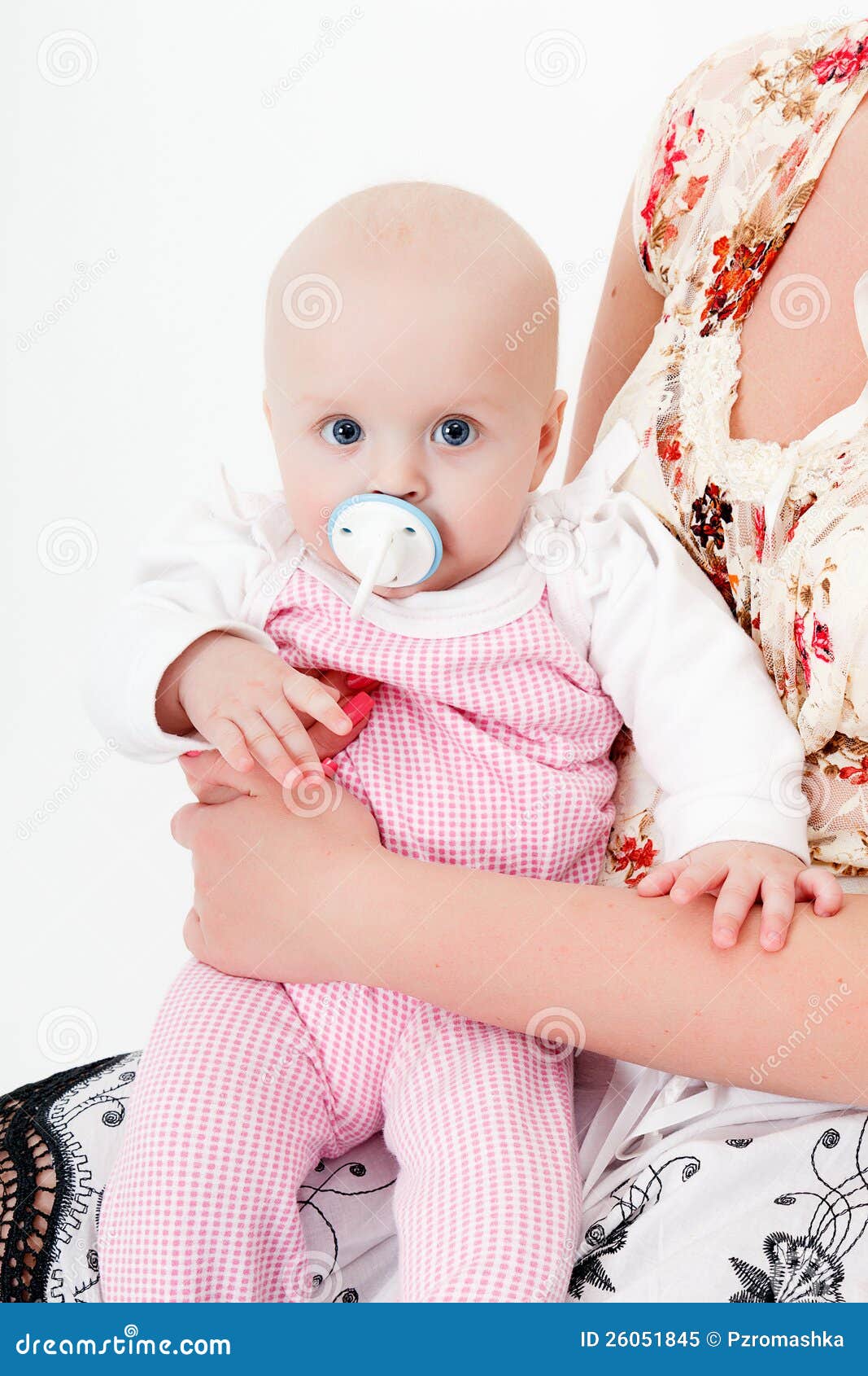 Baby girl with a pacifier stock image. Image of motherhood - 26051845