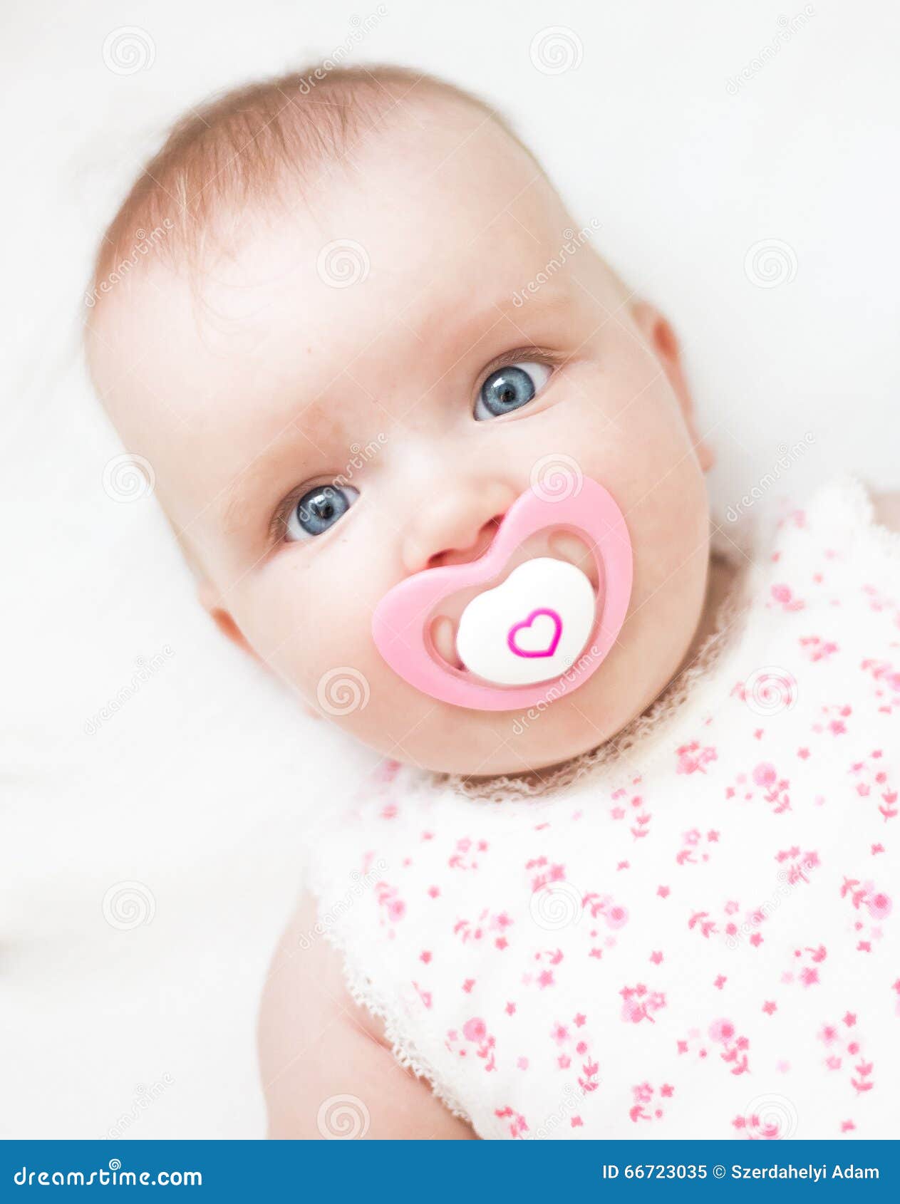 Baby girl with pacifier stock image. Image of girls, portrait - 66723035