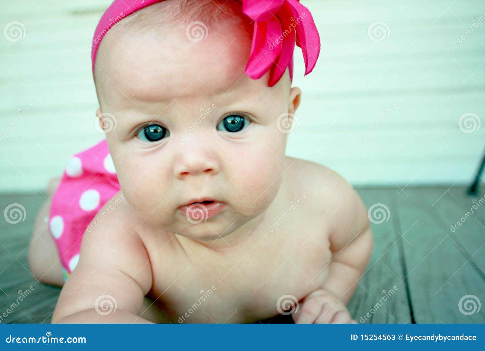 Baby Girl in Pink stock image. Image of blue, eyes, polkadot - 15254563