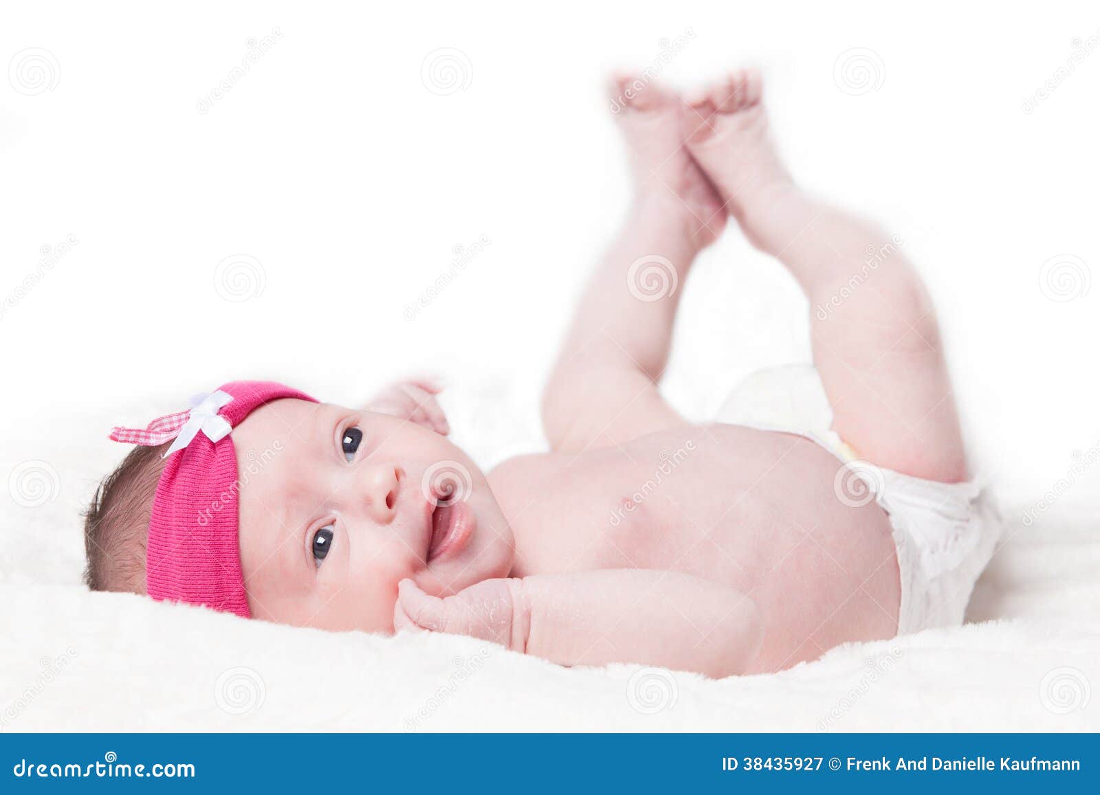 Baby girl on a plaid stock image. Image of relax, gorgeous - 38435927