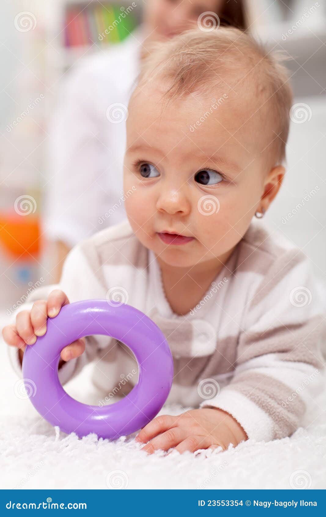 Baby girl with plastic toy stock photo. Image of cheerful - 23553354